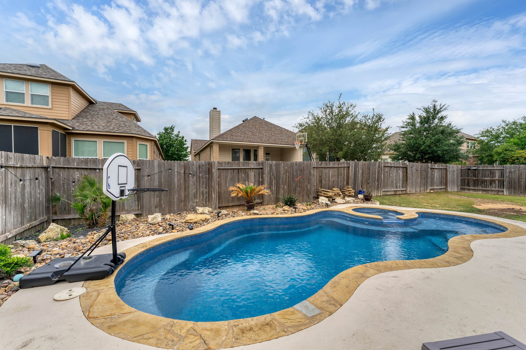 Family Home in a gated subdivision with a pool!