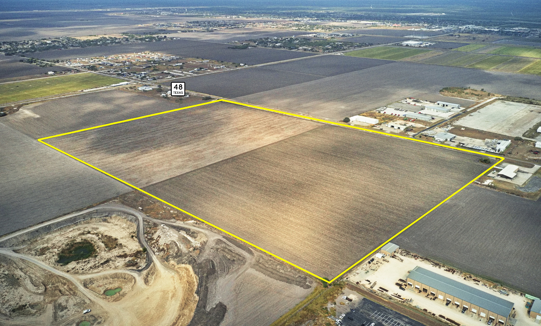 80 Acres of Rich Farm Land with Growing Development